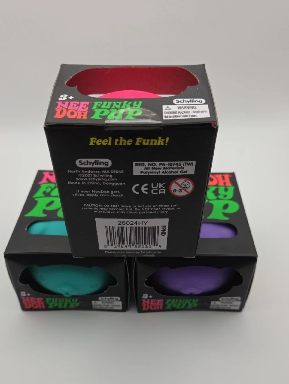 Schylling | Toys | Nee Doh Funky Pup Squishy Toy Pink Teal Purple ...